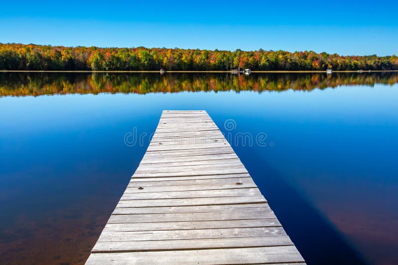 Colorful Trees and a Pier on the Wisconsin River in Early October Stock ...