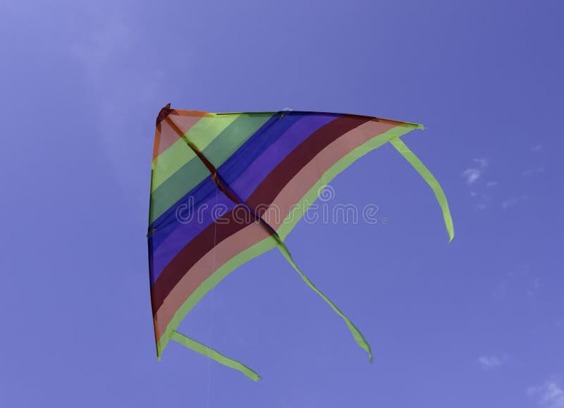 Colorful triangle kite stock photo. Image of playing - 13419050