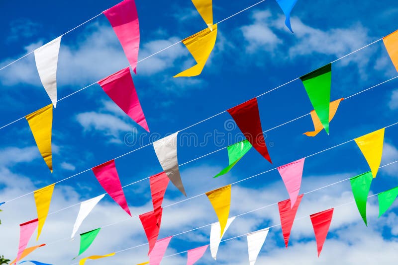 Colorful Triangular Flag Line Moving by Wind on Blue Sky White Cloud ...