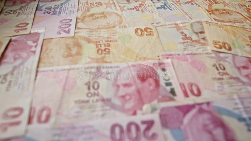 Colorful Turkish Lira Banknotes Scattered on a Flat Surface Showcasing ...