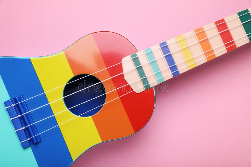 Colorful Ukulele on Pink Background, Top View. String Musical ...