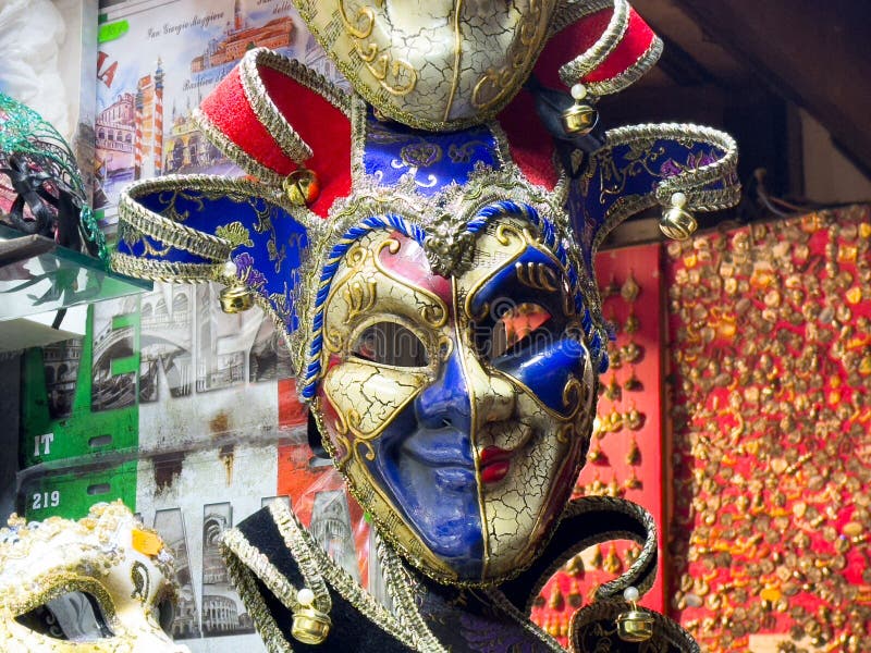 Colorful Venetian Mask with Intricate Design and Bells on Display ...