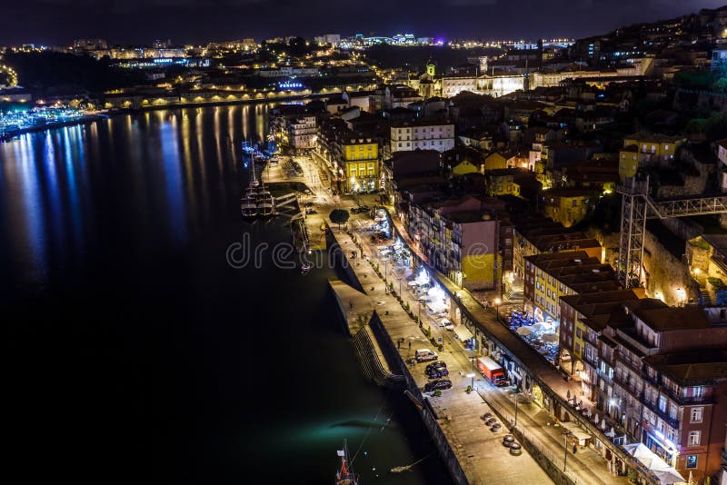 Colorful View at Twilight of the Riverfront with Lights Reflecting in ...
