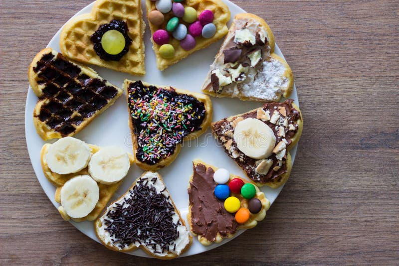 Colorful waffles on plate stock photo. Image of food - 59522852