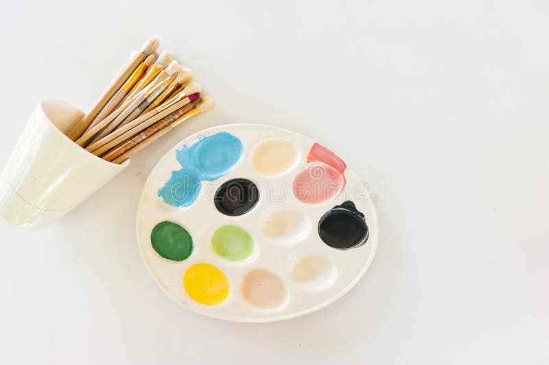 Colour Plate with Brushes stock image. Image of artistic - 106955393