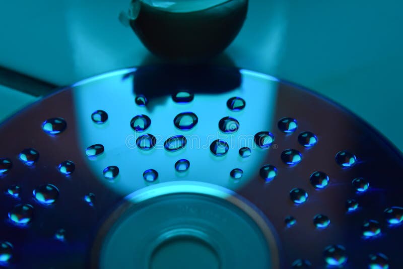 Colorful Water Drop on Piece of CD Stock Image - Image of disc, compact ...