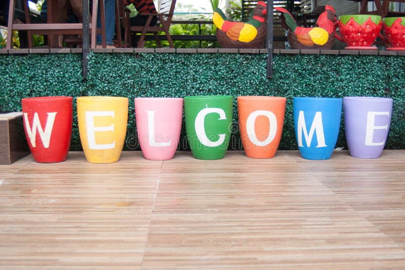 Painted Flower Pots Spell Welcome Stock Image - Image of flower ...