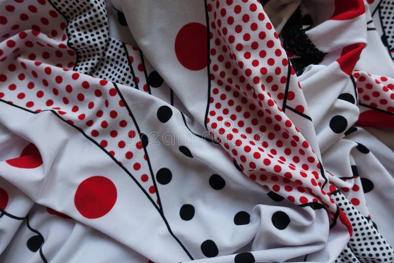 Colorful White, Red and Black Spotted Rayon in Soft Folds Stock Image ...