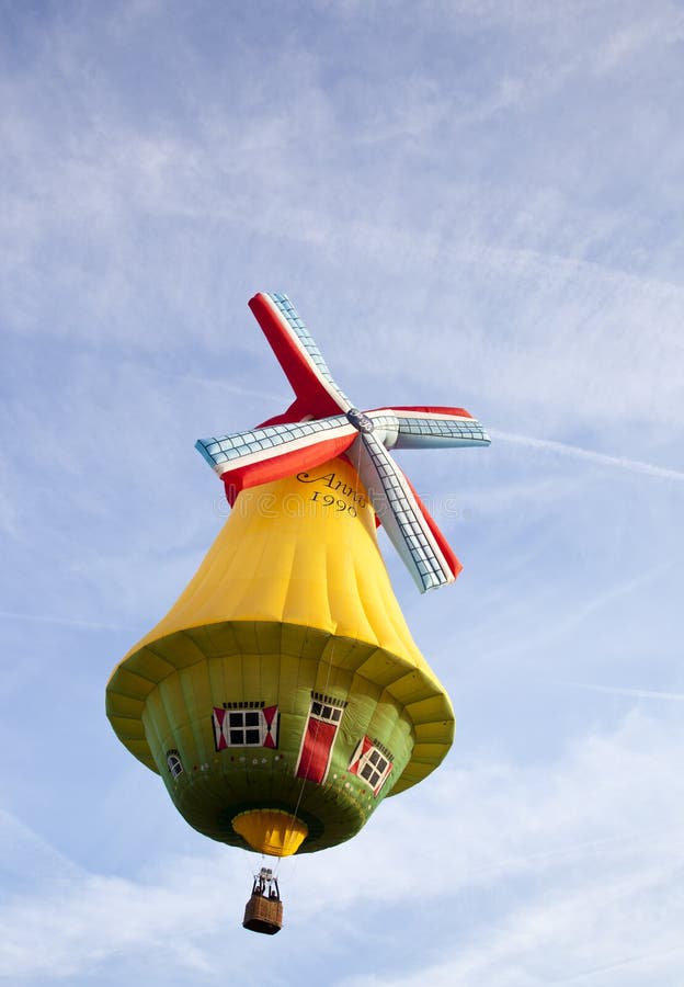 Colorful Wind Mill Balloon Taking Off Editorial Stock Image - Image of ...