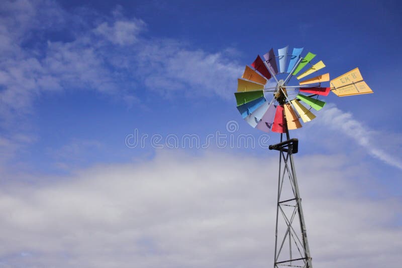 Colorful Wind Mill Isolated on Blue Sky Stock Image - Image of pump ...