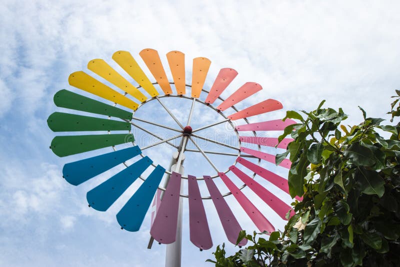 Colorful Wind Turbine (windmill) on a Blue Sky Stock Photo - Image of ...