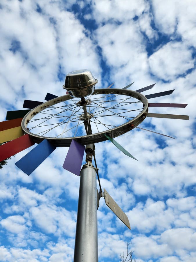 Colorful Wind Vane Made of a Bike Wheel Stock Image - Image of aviation ...