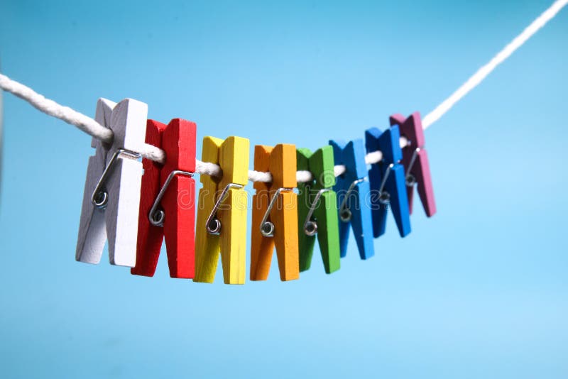 Colorful Wooden Pegs Series 2 Stock Image - Image of pegs, held: 74667535