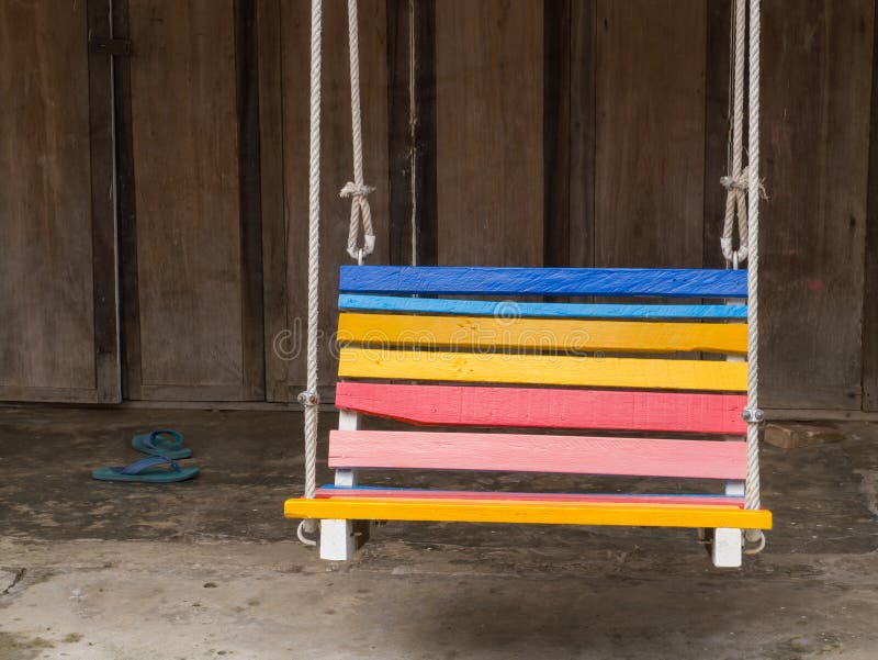 Colorful wooden swing stock image. Image of house, moving - 62689589