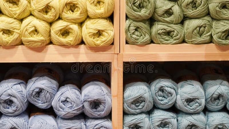 Colorful Yarn Threads Displayed on a Shop Window, Inviting Creativity ...