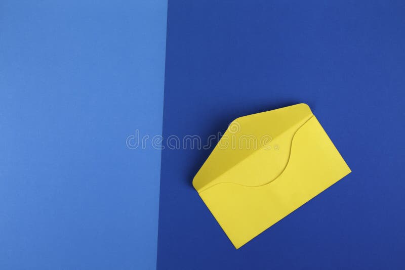 Colorful Yellow Envelope on Blue Background Stock Photo - Image of ...