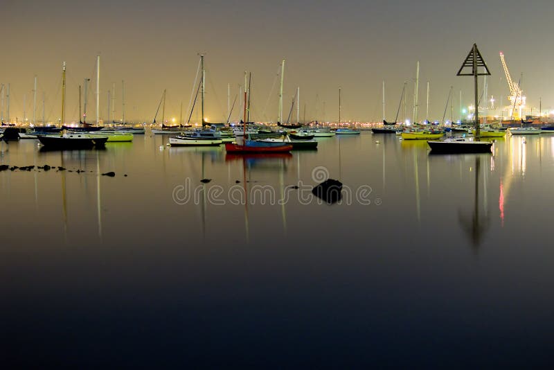 Yachts at night stock photo. Image of boats, reflection - 25175598