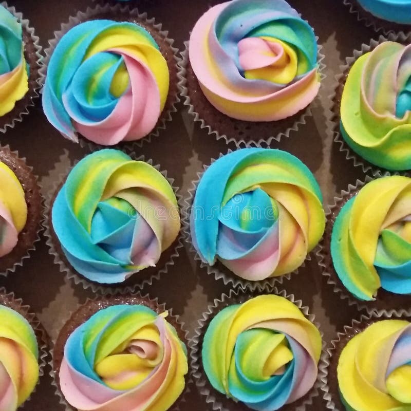 Colorful Royal Glace Cupcakes Stock Photo - Image of snack, buttercream ...