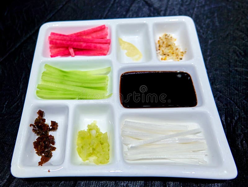 Colorfull Set of Traditional Chinese Snacks and Sauce on Plastic Dish ...