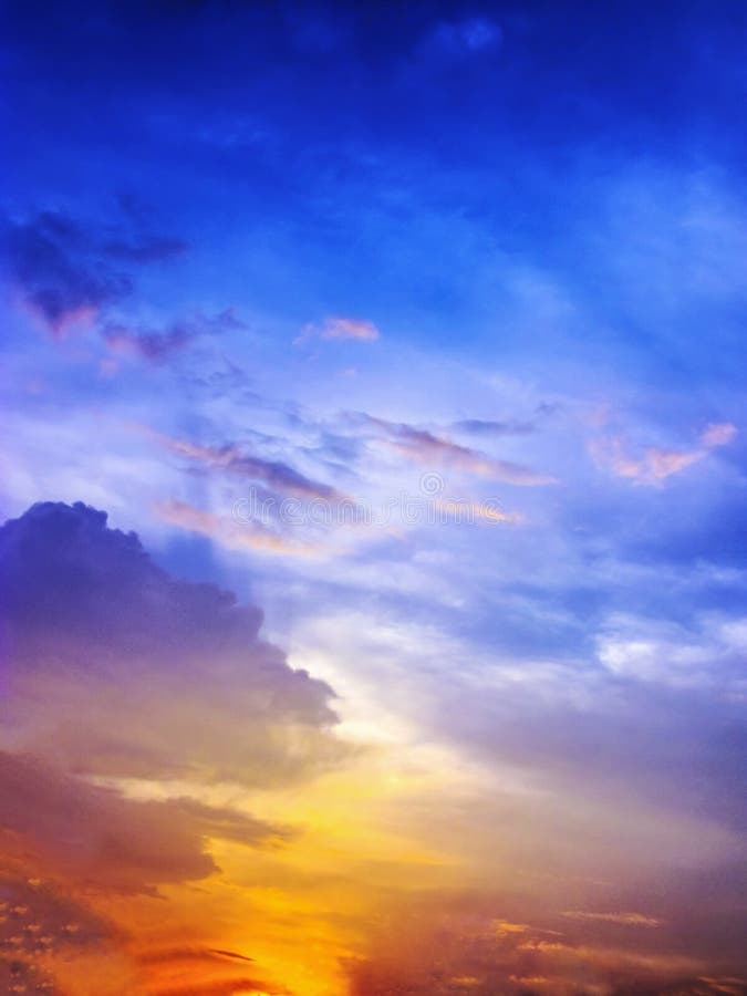 Sunset Sky of Multiple Colors Scaterred Ray of Sunlight Stock Photo ...