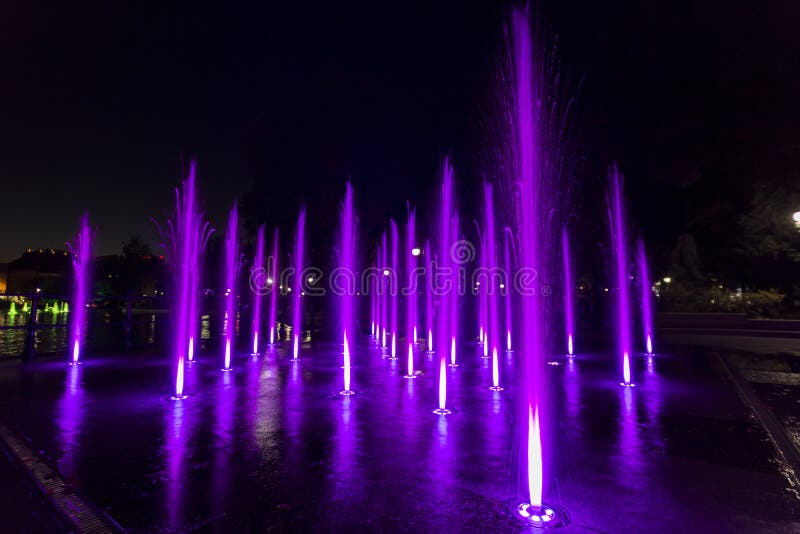 Colorfully lit fountain stock image. Image of musical - 81139091