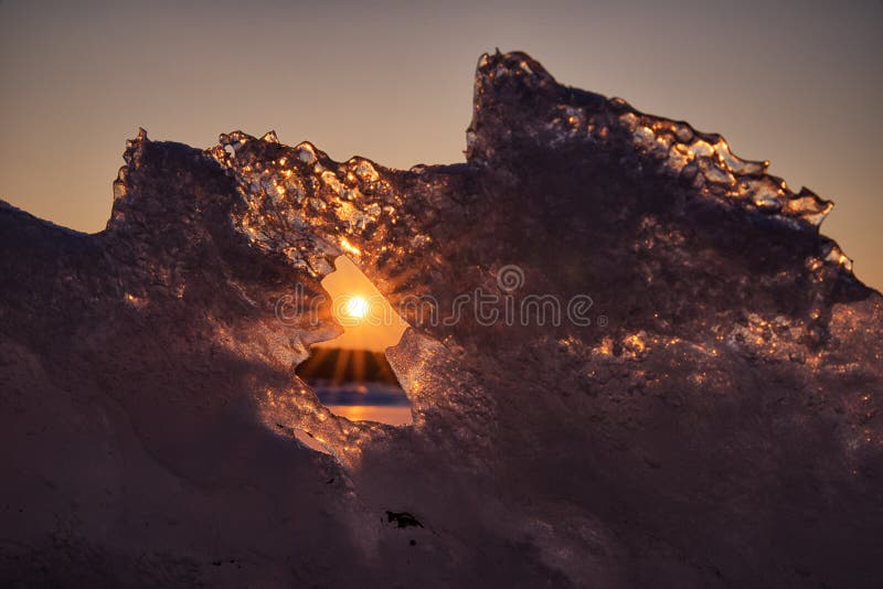 Sun rays through ice stock image. Image of sunrise, sunset - 112650107