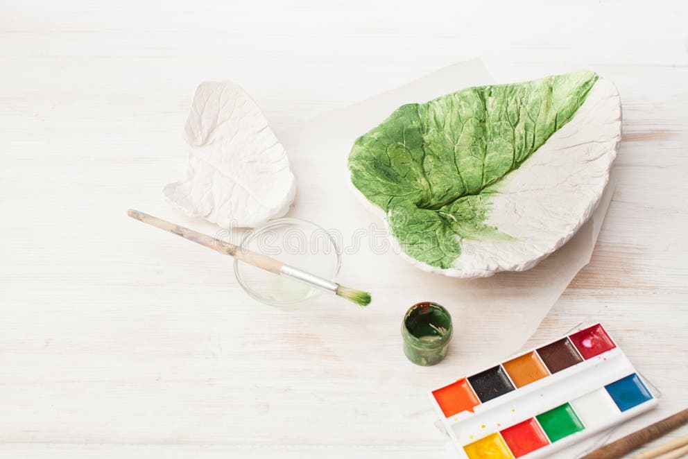 Coloring the Plaster Form of the Sheet with Hands Stock Image - Image ...