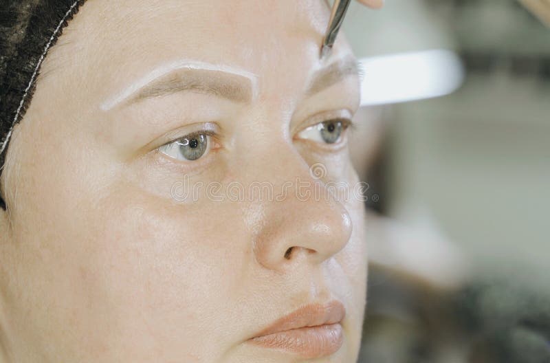 Coloring with White Lines of the Shape of the Eyebrows on the Face ...