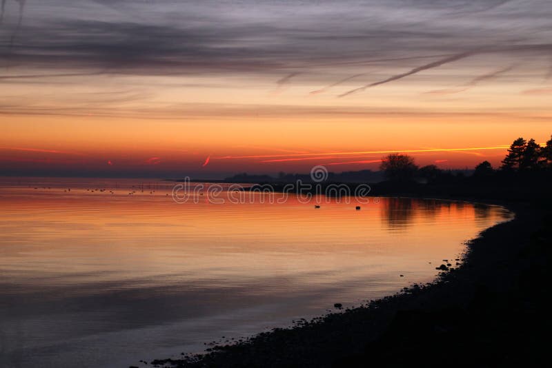 Colors change after sunset stock image. Image of reflection - 90530613