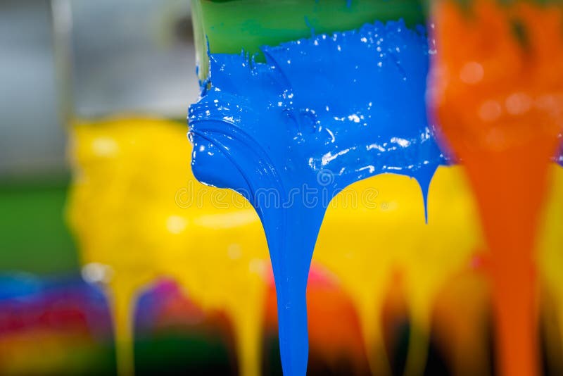 Colors Dripping from the Rubber Print Handle Stock Photo - Image of ...