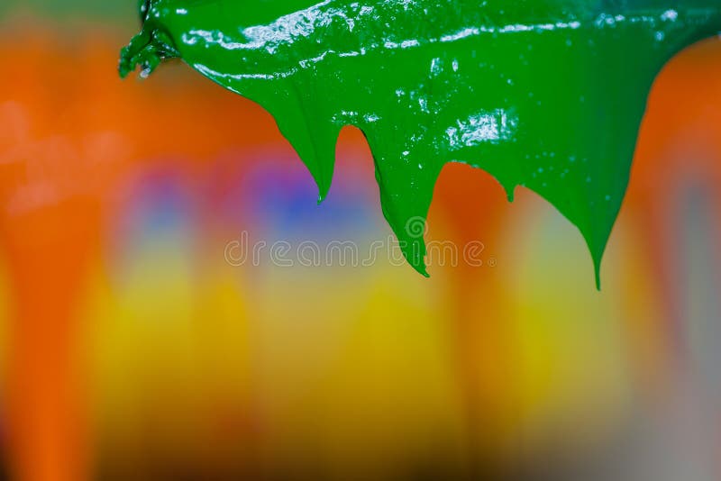 Colors Dripping from the Rubber Print Handle Stock Photo - Image of ...