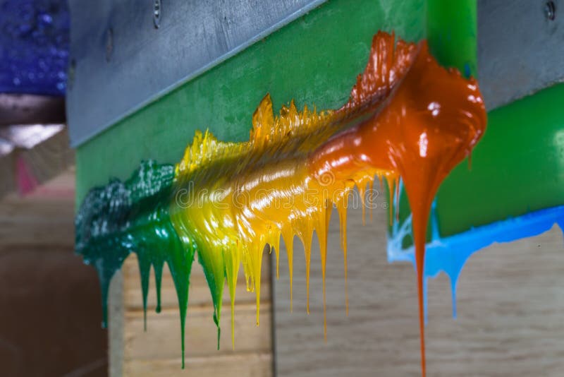 Colors Dripping from the Rubber Print Handle Stock Image - Image of ...