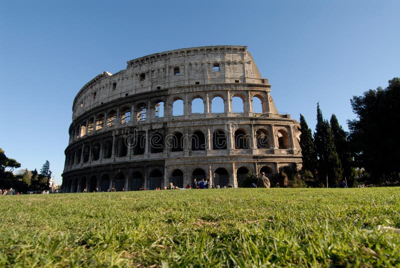 Colosseum and green lawn stock photo. Image of lawn, copy - 1461294