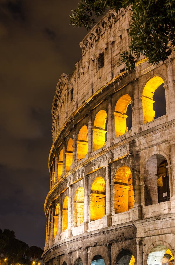 Colosseum at night stock image. Image of famous, yellow - 38073151