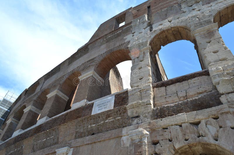 The Colosseum from the Outside Stock Photo - Image of arena, clouds ...