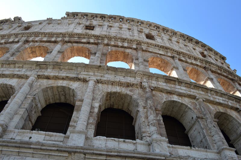 The Colosseum from the Outside Stock Photo - Image of arena, clouds ...