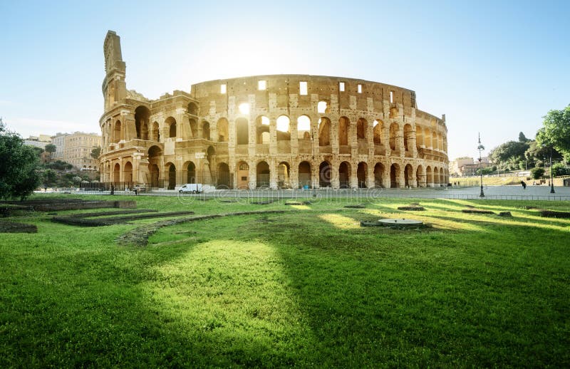 Colosseum in Rome and Morning Sun Stock Image - Image of morning, forum ...