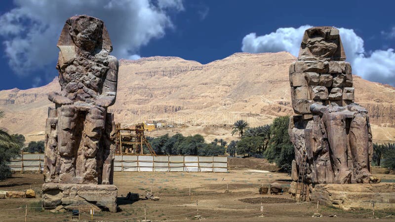 Colossi of Memnon Gigantic Statues in Luxor Egypt - Tilt View 4k Stock ...
