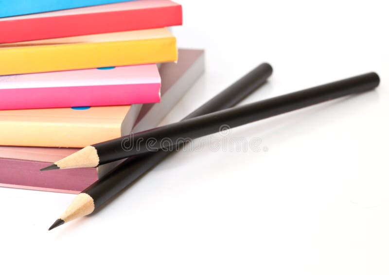 Black pencil and books. stock image. Image of object - 30176803