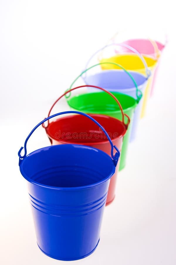 Coloured buckets in line stock photo. Image of blue, buckets - 8343592
