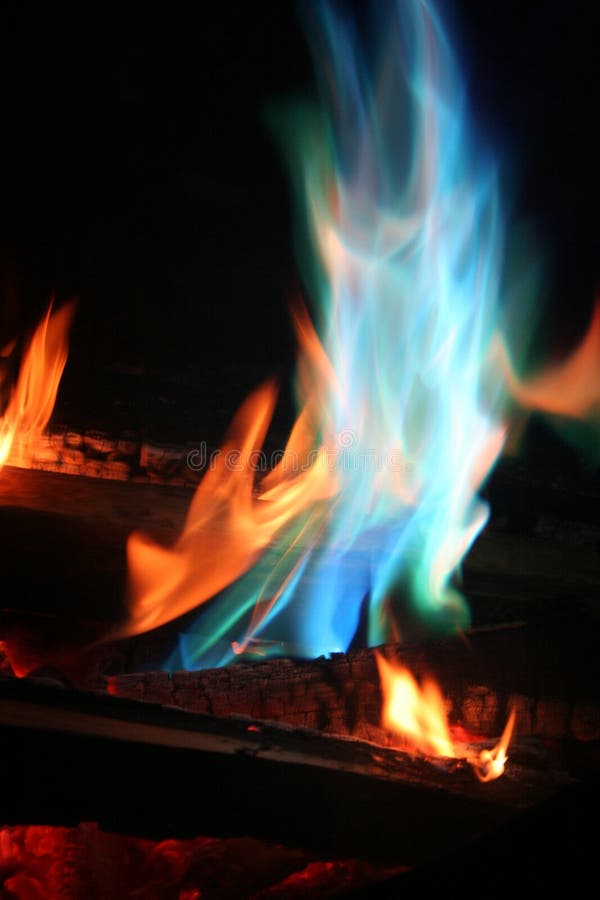 Coloured Flames stock photo. Image of blue, night, logs - 20340090