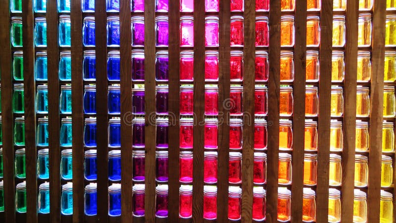 Coloured Glass Pots in a Wall Stock Photo - Image of wall, blue: 53961738