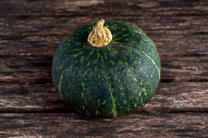 Coloured Green Autumn Pumpkin on Wooden Background Stock Photo - Image ...