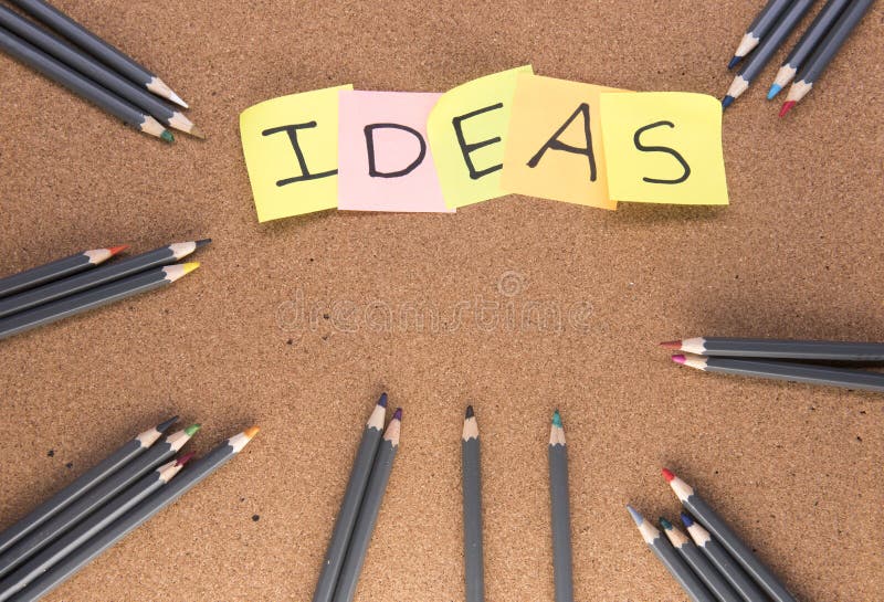 Coloured Pencils with Ideas Written on Post it Notes Stock Image ...