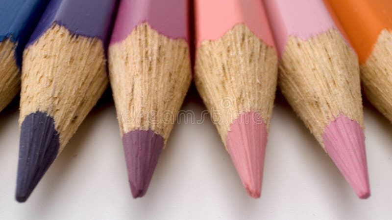 Coloured pencils in a row stock image. Image of pencils - 204936265