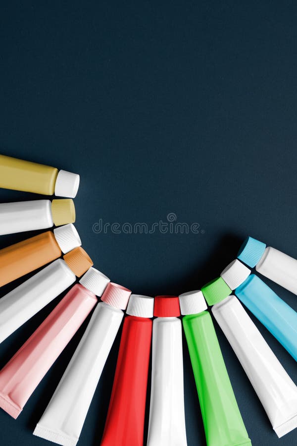 Coloured Plastic Tubes on Dark Background Stock Image - Image of ...