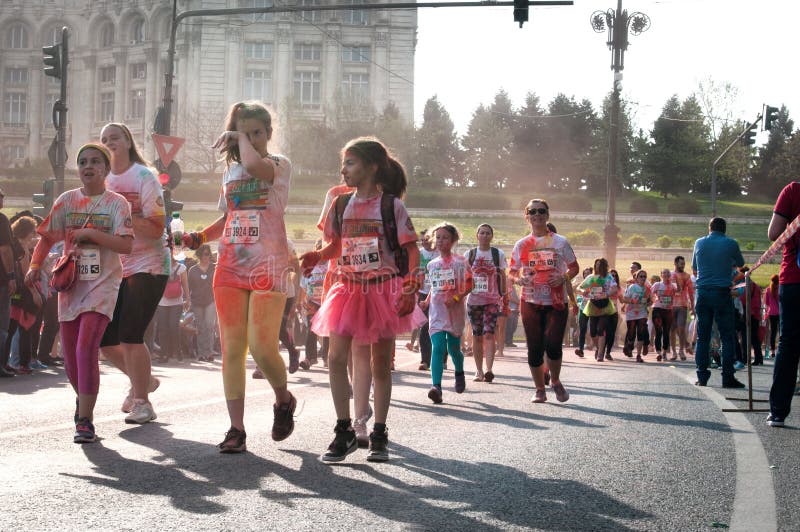 Coloured runners editorial image. Image of building, colours - 53616425