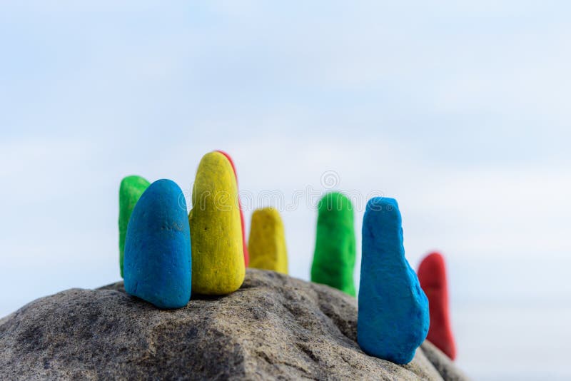 Coloured stones on boulder stock photo. Image of fantasy - 84373584