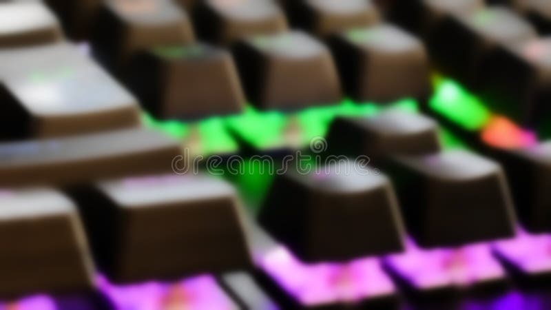 Colourful Backlit Keyboard Blurred Background. Technology and it ...