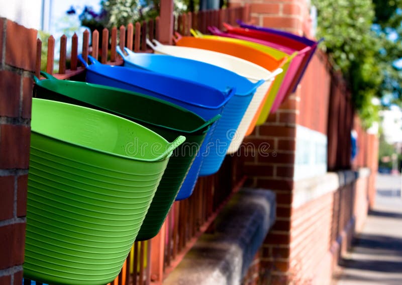 Colourful buckets stock photo. Image of blue, yellow, wooden - 7534828